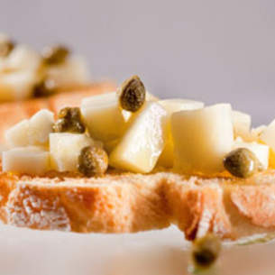 Majorero cheese, olive oil & caper canapé | Foods & Wines from Spain